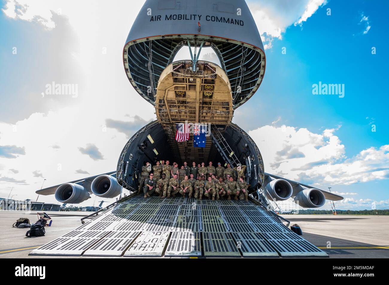 U.S. Air Force Airmen pose for a photo on a C-5M Super Galaxy at RAAF ...