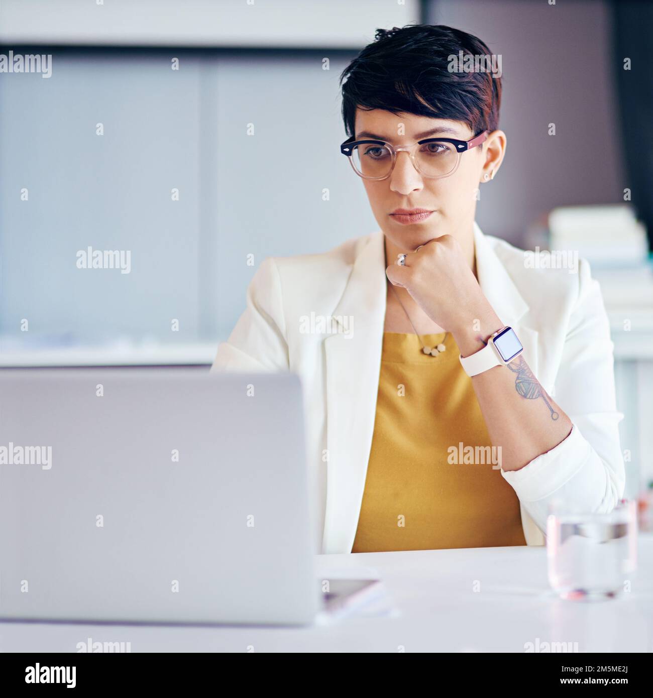 Shes always 100 percent focused. a young businesswoman working at her ...