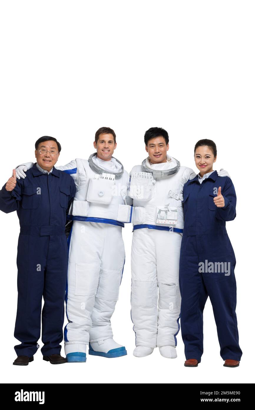 Photo shoot male astronauts and engineer team Stock Photo - Alamy