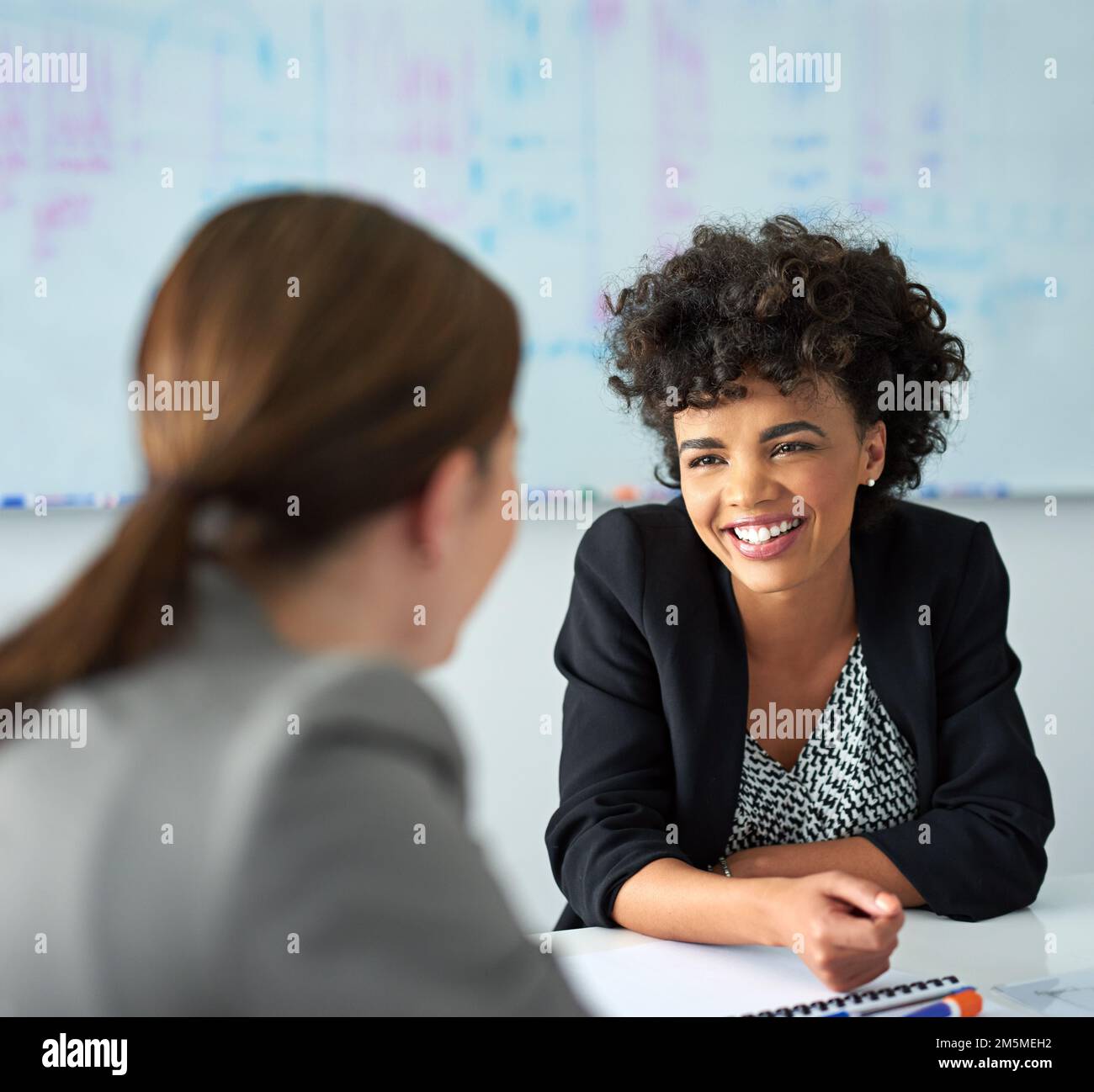 Theyve got a positive working relationship. two businesswomen enjoying ...