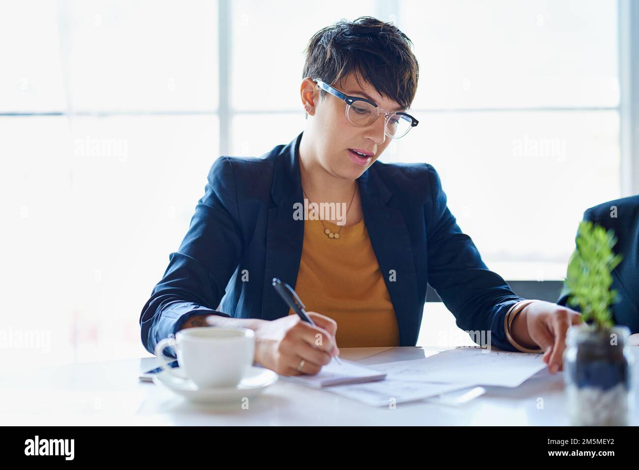 Consistent action creates consistent results. a businesswoman working ...