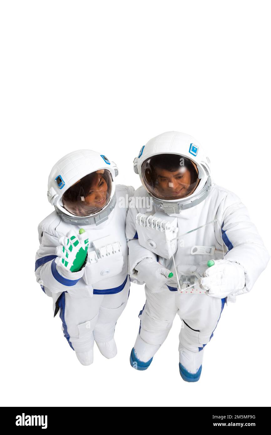 Astronauts wearing suits hi-res stock photography and images - Alamy