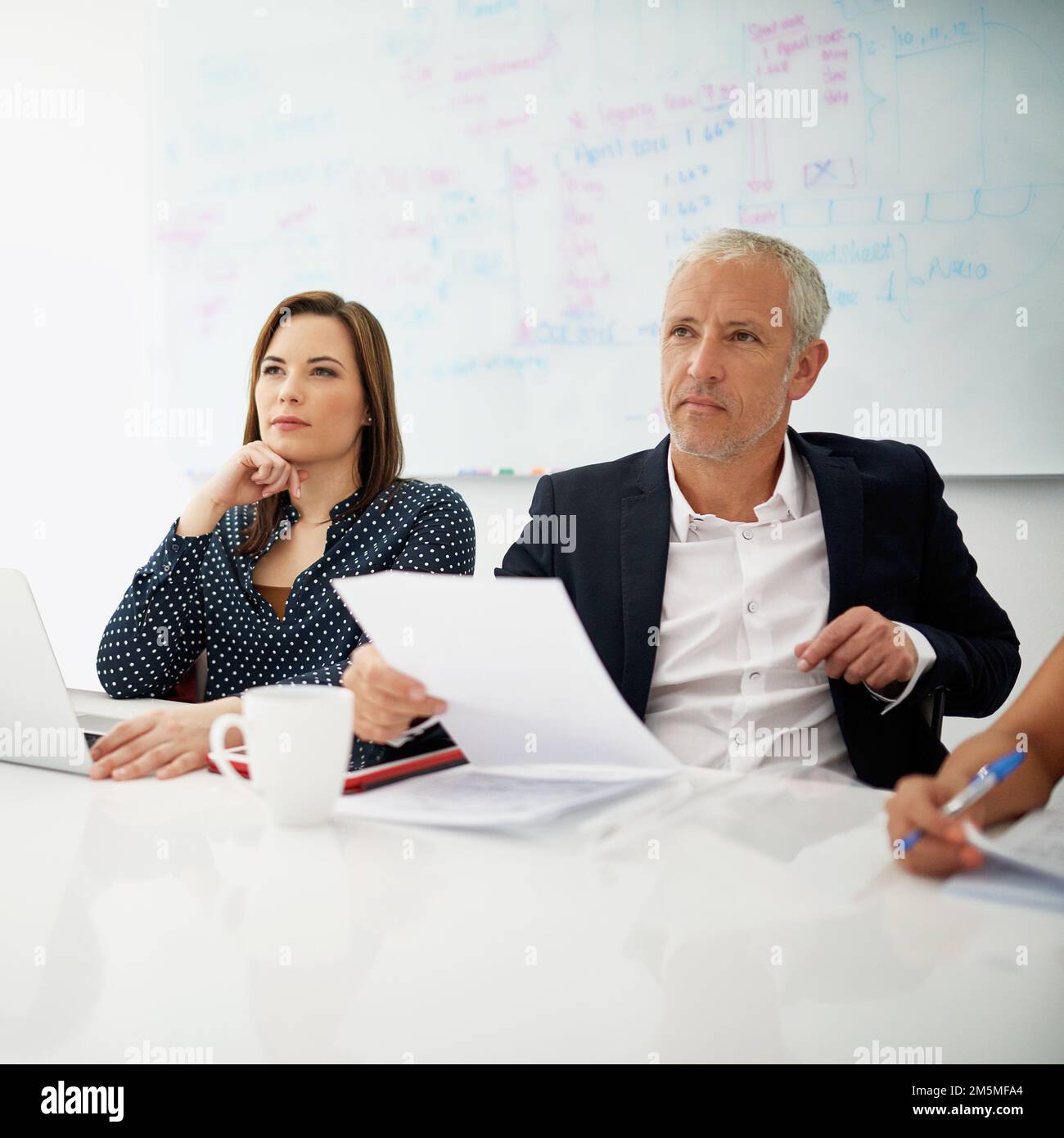 Looks like an interesting presentation. a group of business colleagues ...