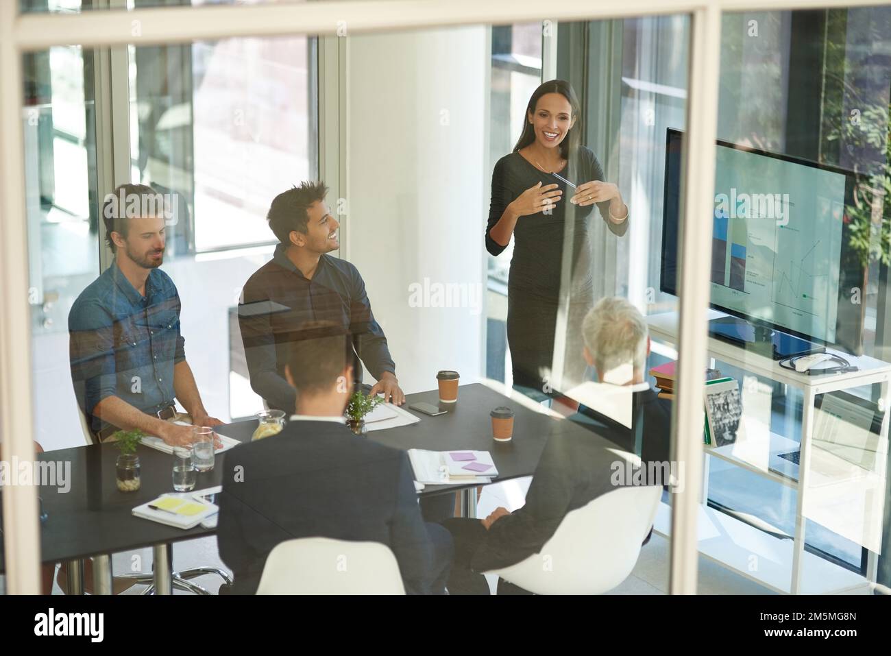 Taking stock and setting new targets. a corporate businessperson giving ... Taking stock and setting new targets. a corporate businessperson giving ...