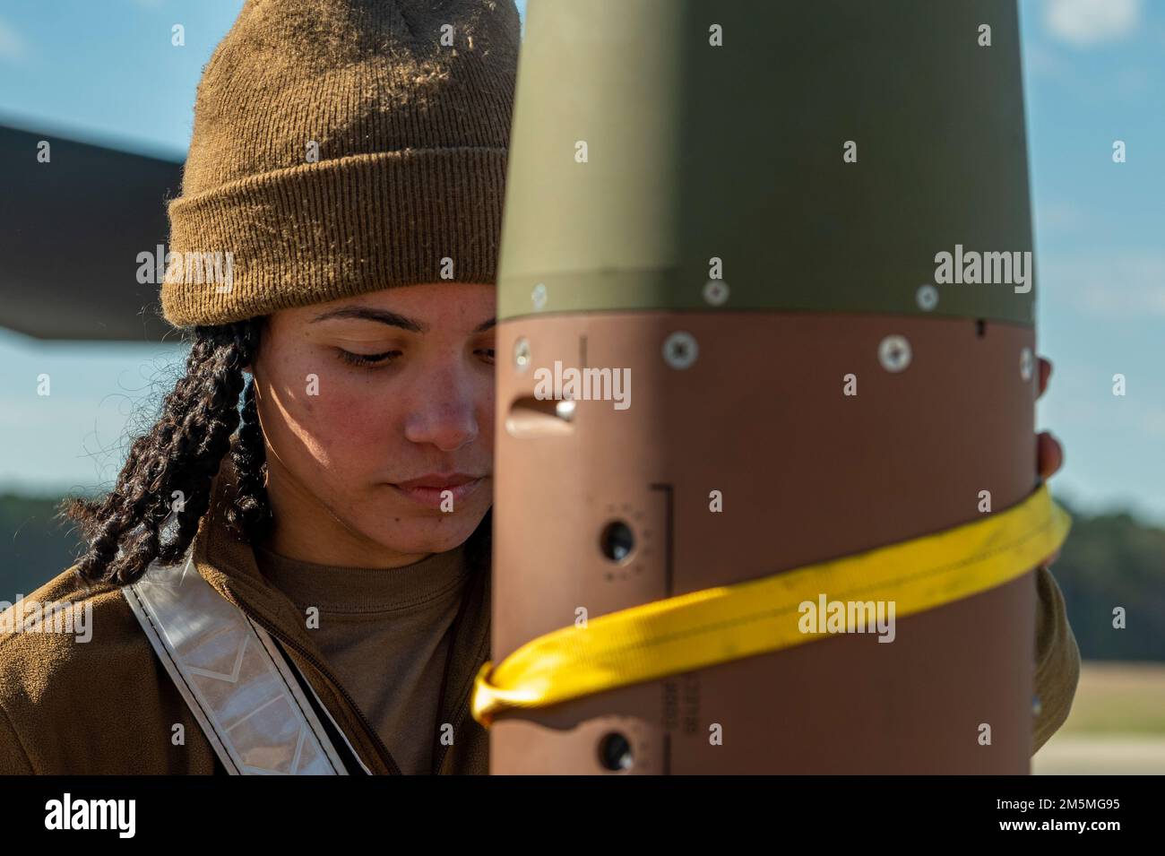 A weapons load crew member assigned to the 335th Fighter Generation ...