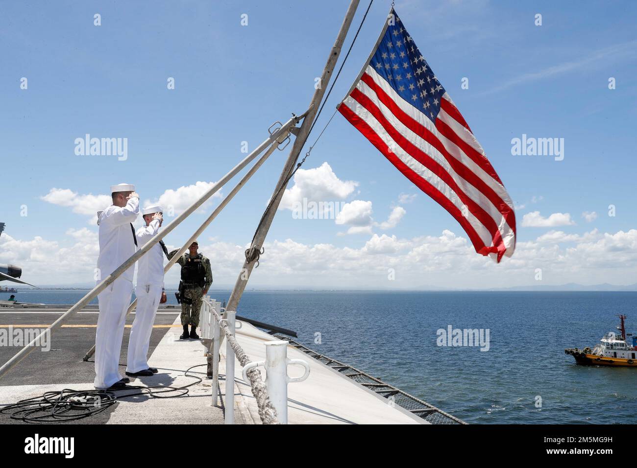 MANILA BAY, Philippines (March 25, 2022) Aviation Ordnanceman Airman Colton Gilbert, left, from ...