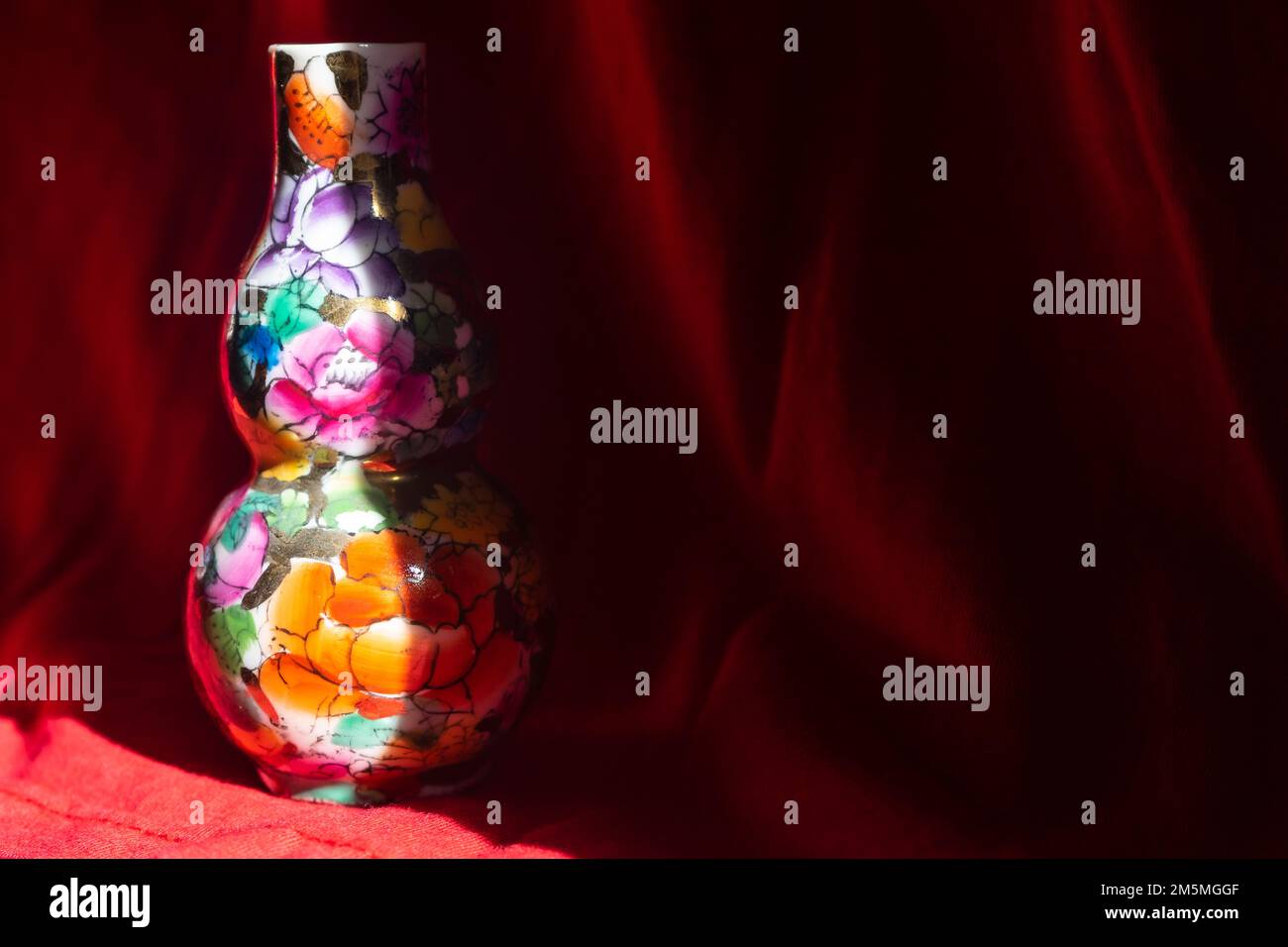 Chinese ceramic in an auction against a red background. Chinese New ...