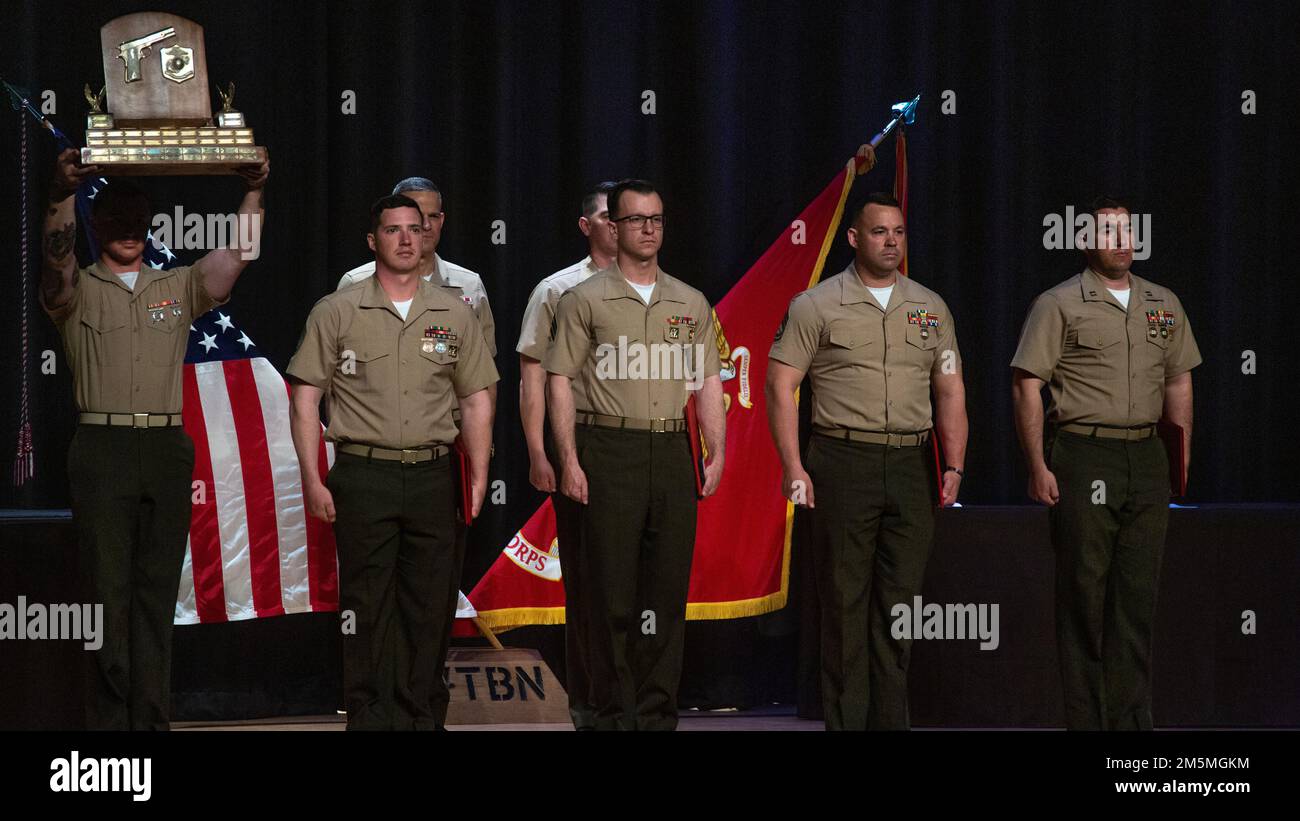 U.S. Marines with Marine Corps Security Forces Regiment, receive the ...