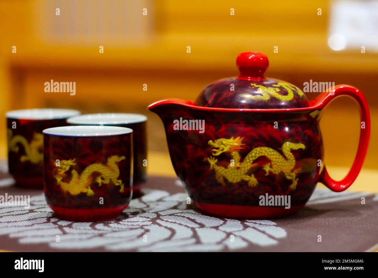 Chinese tea cup set on red background Stock Photo - Alamy
