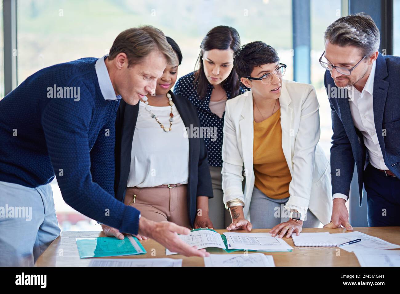 Getting into the details. corporate businesspeople meeting in the ...