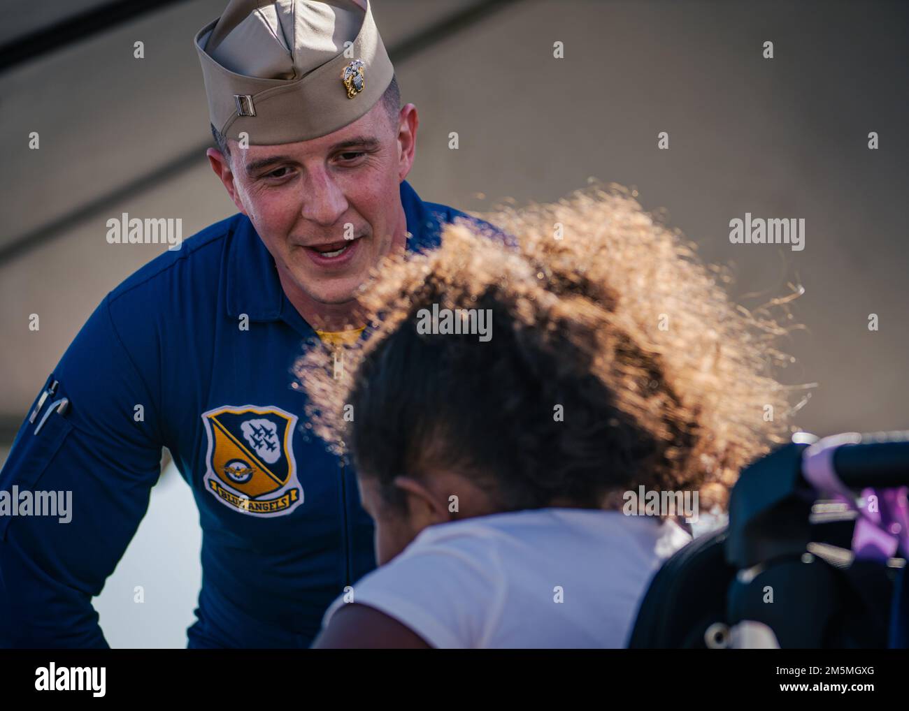 U.S. Navy Lt. Griffin Stangel, pilot for the Blue Angels, speaks with a ...