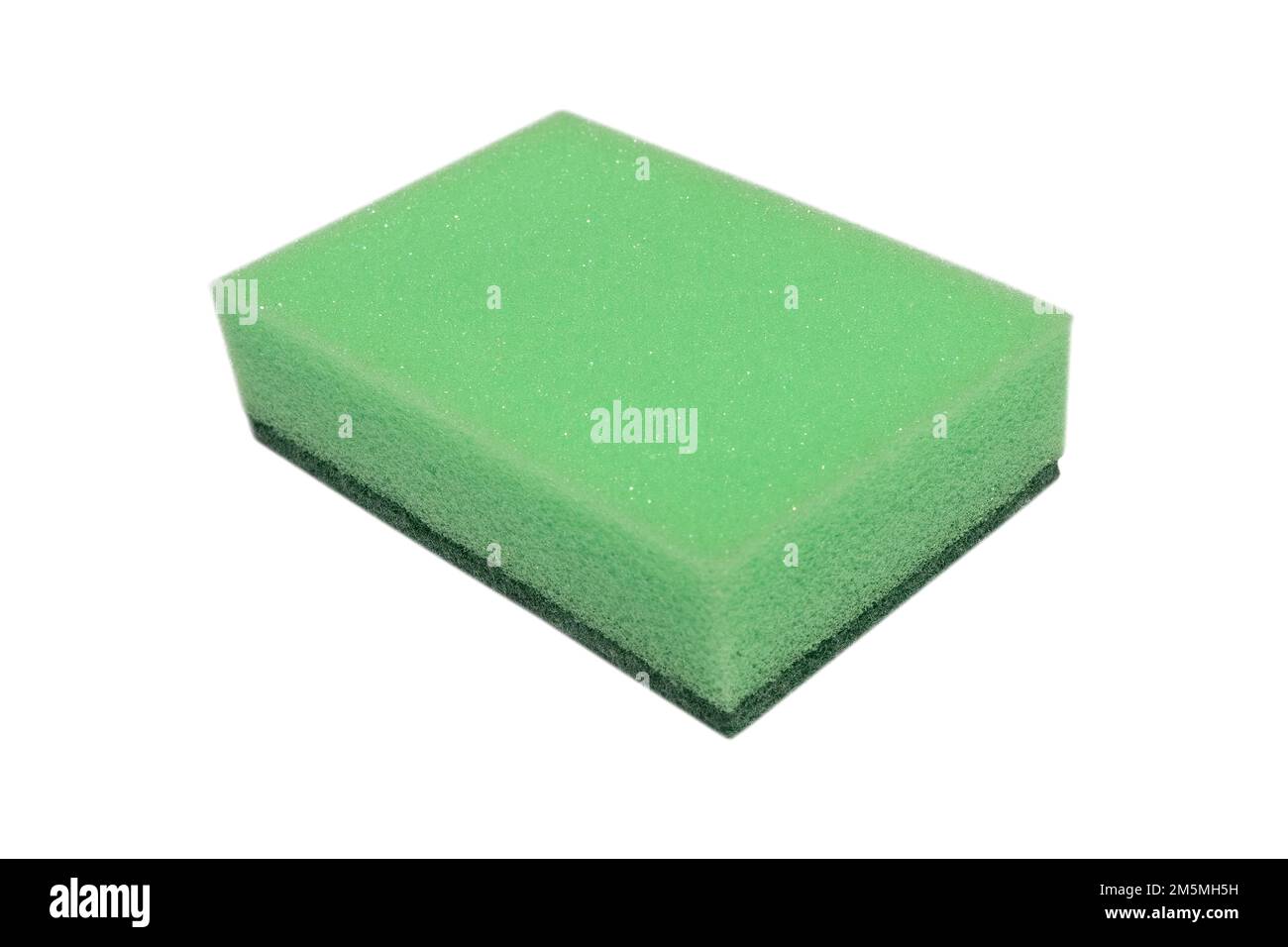 Macro shot of a surface of plastic green sponge isolated on white ...