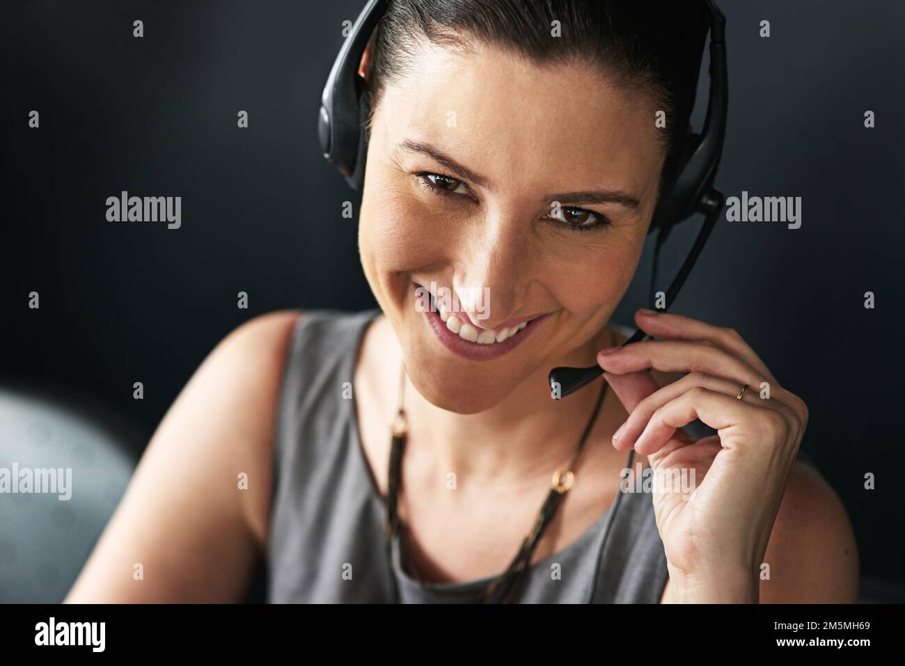 Let me direct your call. Cropped portrait of a female receptionist ...