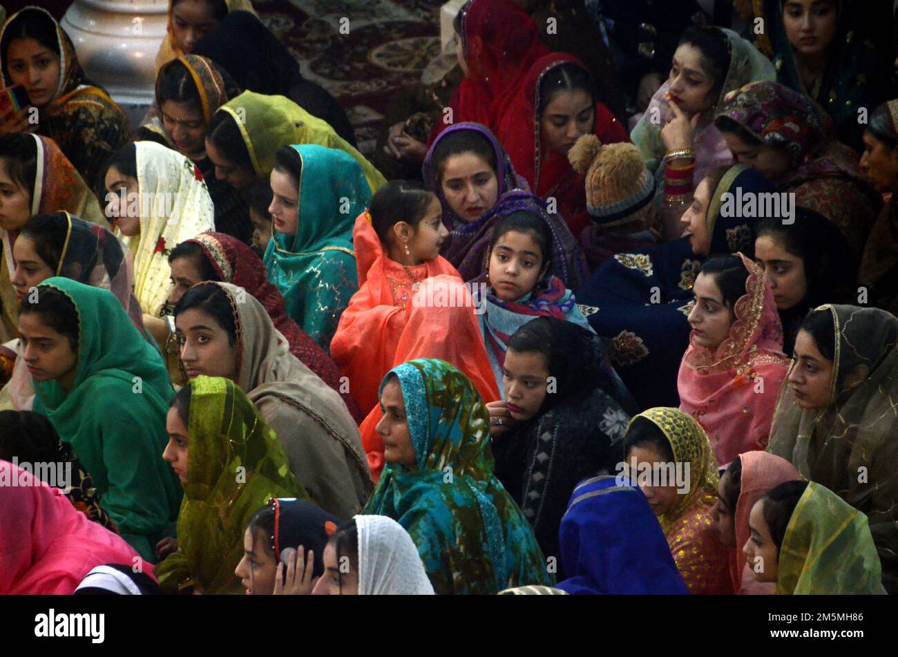 Peshawar, Pakistan. 28th Dec, 2022. Sikh devotees take part in a ...