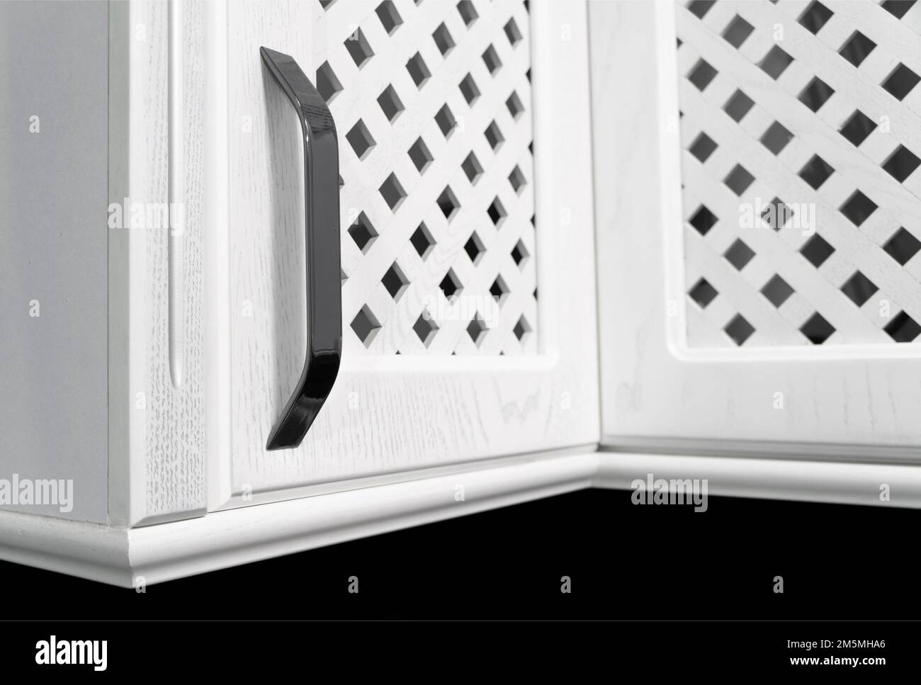 Modern kitchen interior. Handles on kitchen cabinets. Salon with ...