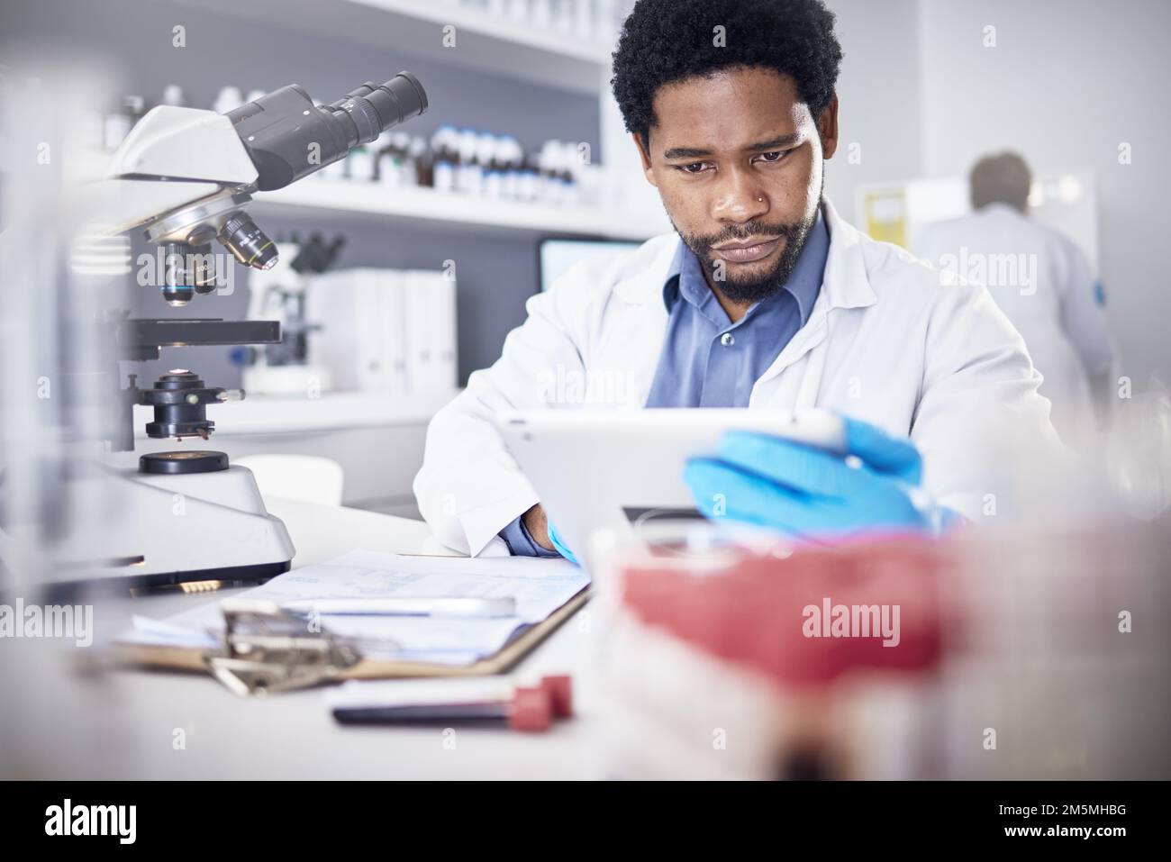 Science, research and black man with tablet, focus and innovation for ...