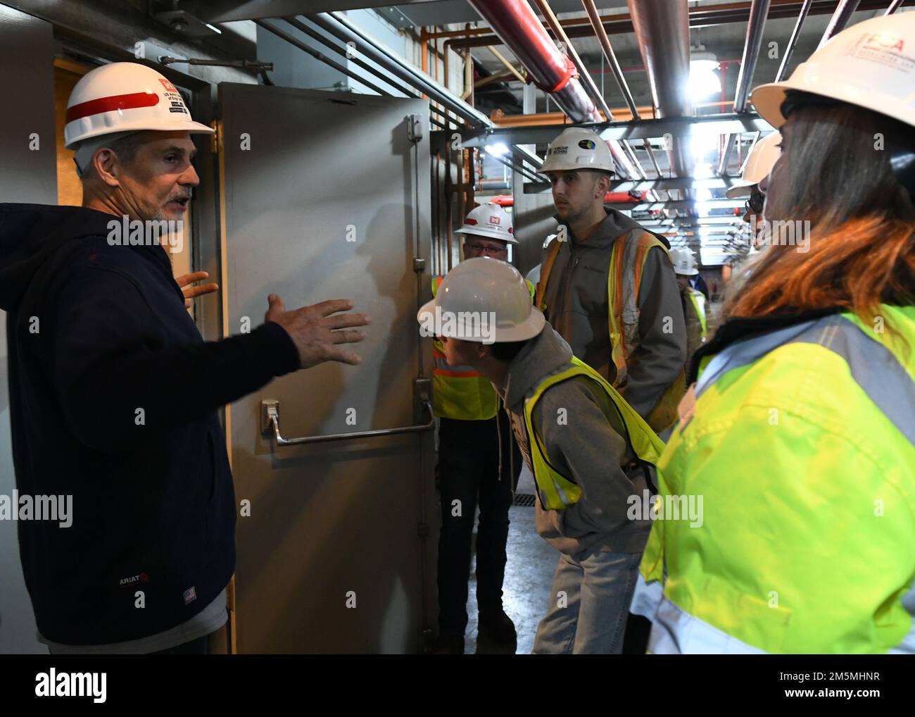 Lipscomb University students peer up at a generator turbine located ...