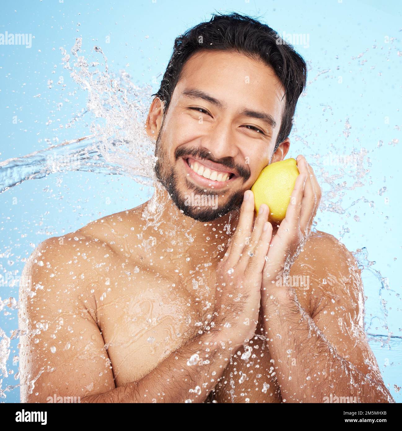 Skincare, water and portrait of man with a lemon in studio for healthy ...