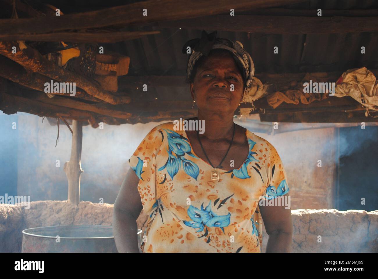 African mama in her food stall Benin Stock Photo - Alamy