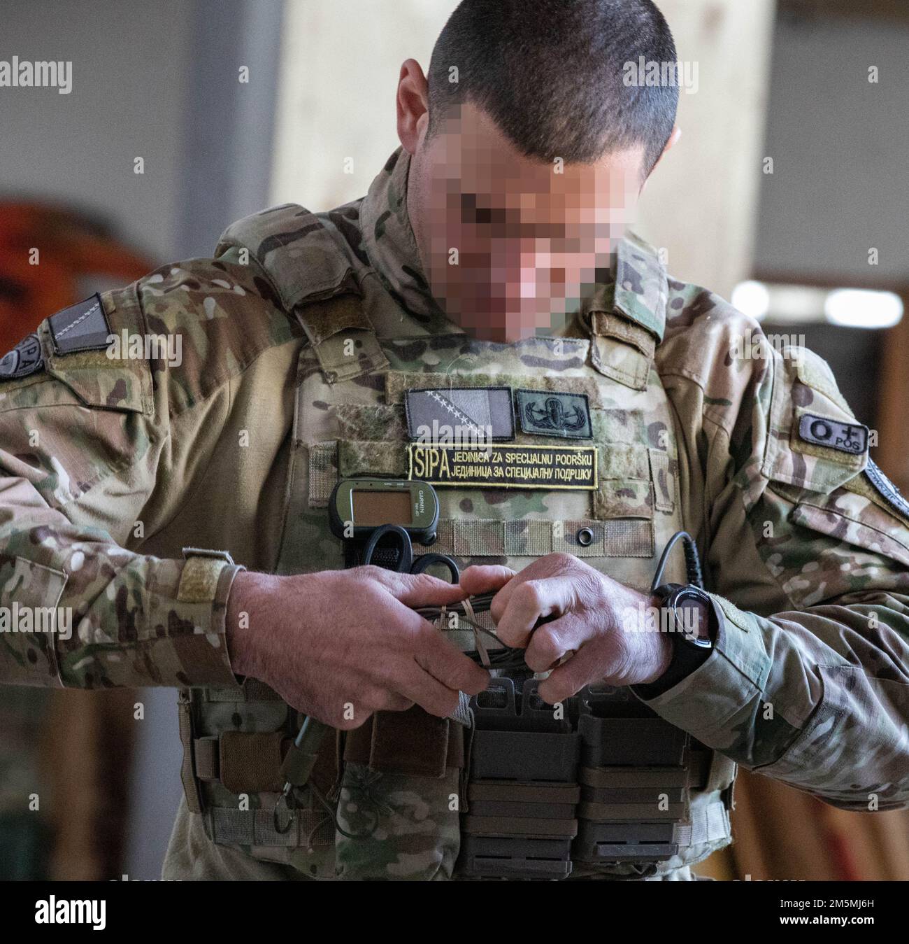 A member of the Bosnia and Herzegovina State Investigation and ...