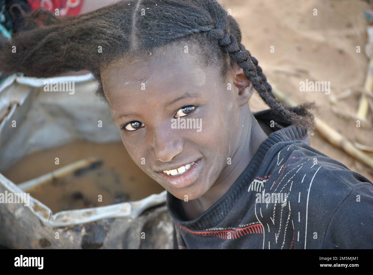 African girl get new haircut Niger Stock Photo - Alamy