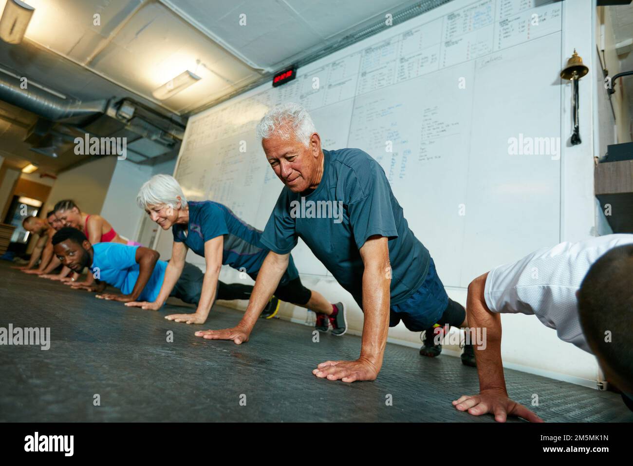 Exercise becomes more important as you get older. a group of people ...