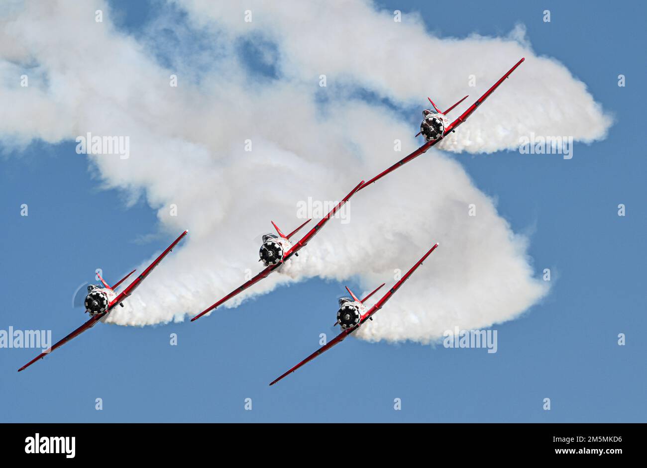 The AeroShell Aerobatic Team performs an aerial maneuver at the 2022 ...