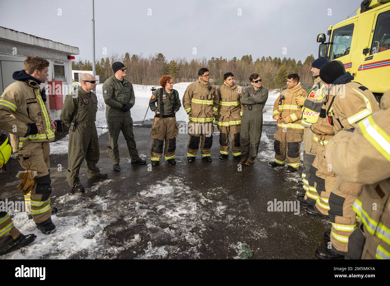 U.S. Marines and Norwegians participate in a group discussion as part ...