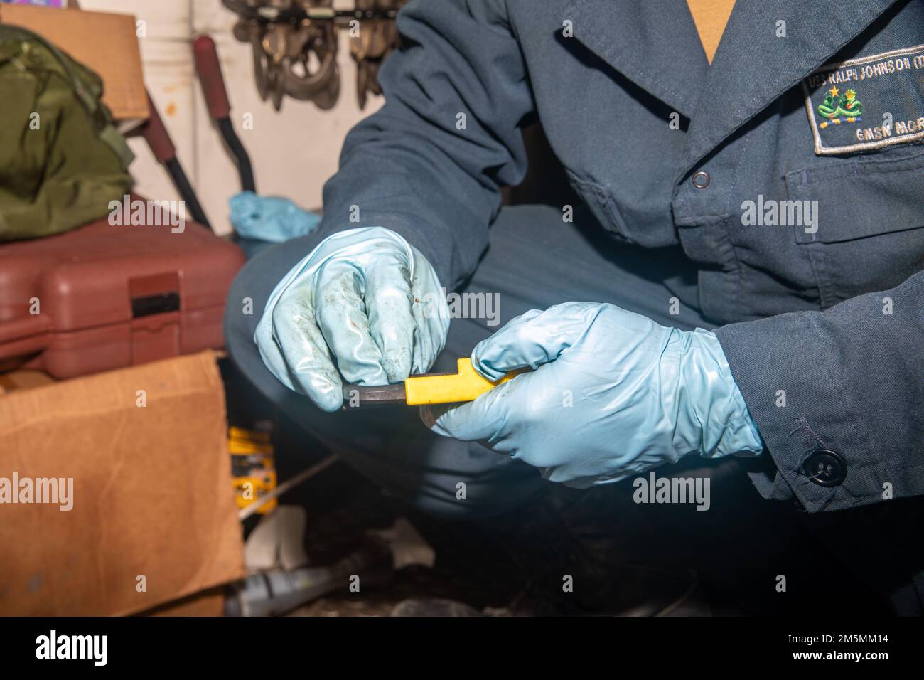 EAST CHINA SEA (March 26, 2022) Gunner’s Mate Seaman Robert Mora, from ...