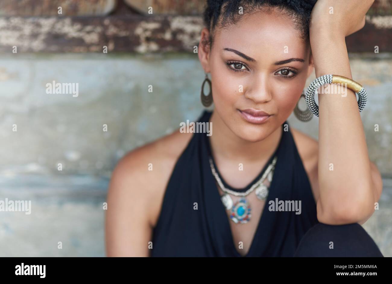 Shes a true beauty. Portrait of an attractive young woman posing outdoors Stock Photo - Alamy