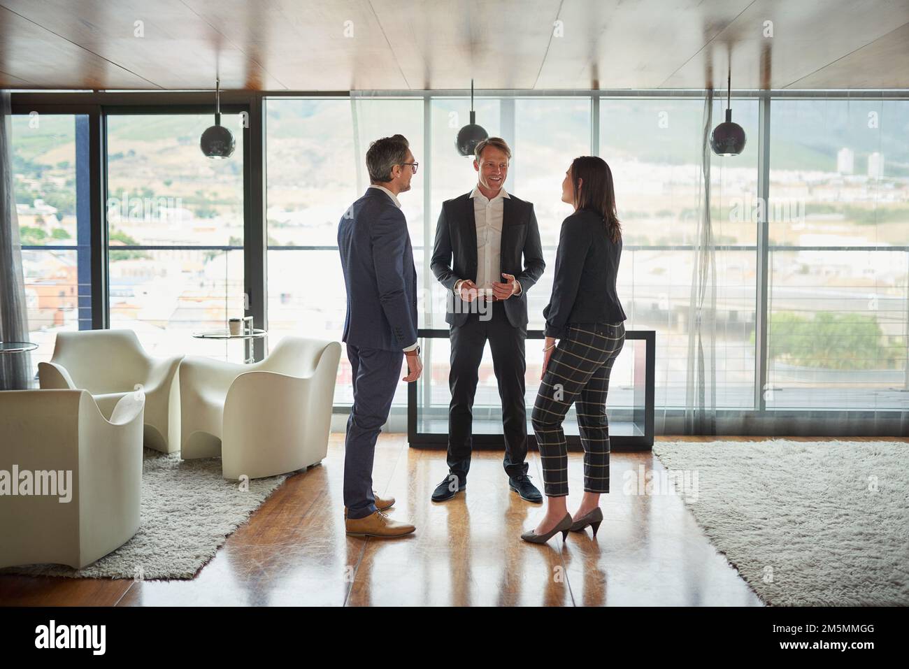 Group three men one woman hi-res stock photography and images - Alamy