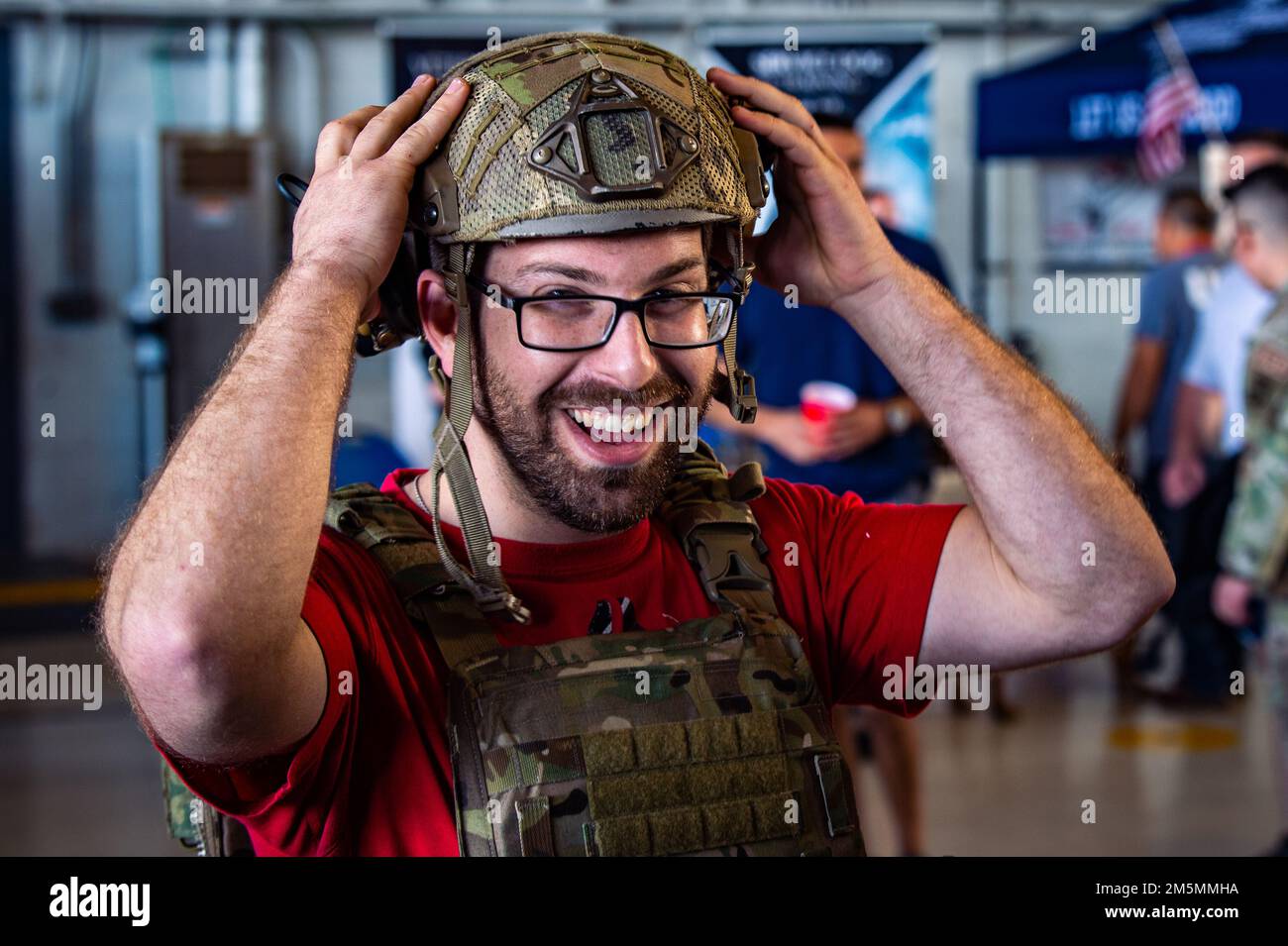 A visitor puts on military prop gear during the Tampa Bay AirFest at ...