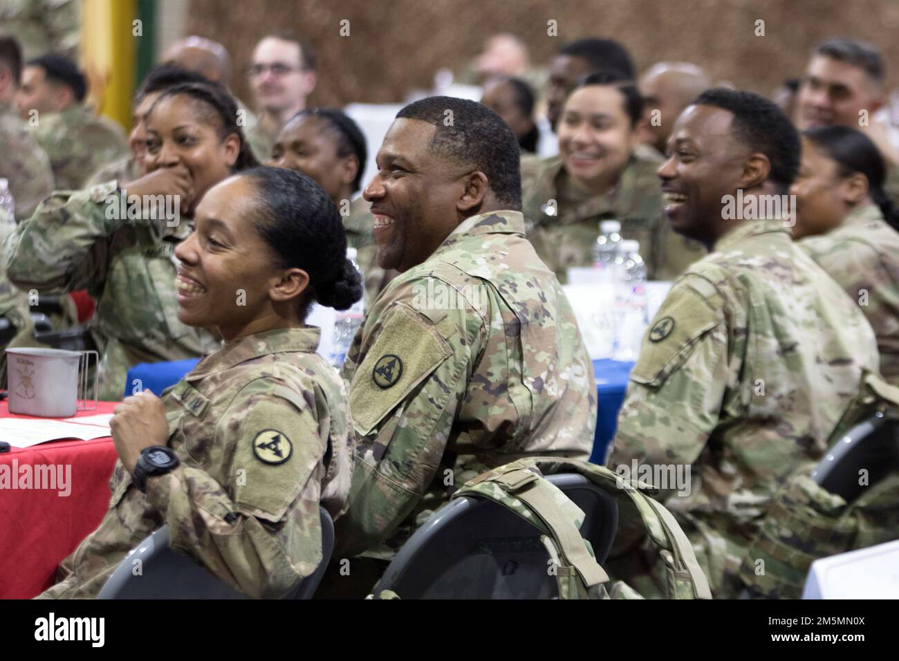 Soldiers assigned to 3rd Expeditionary Sustainment Command laugh during ...