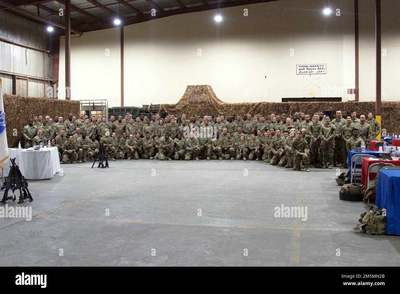 Soldiers assigned to 3rd Expeditionary Sustainment Command pose for a ...