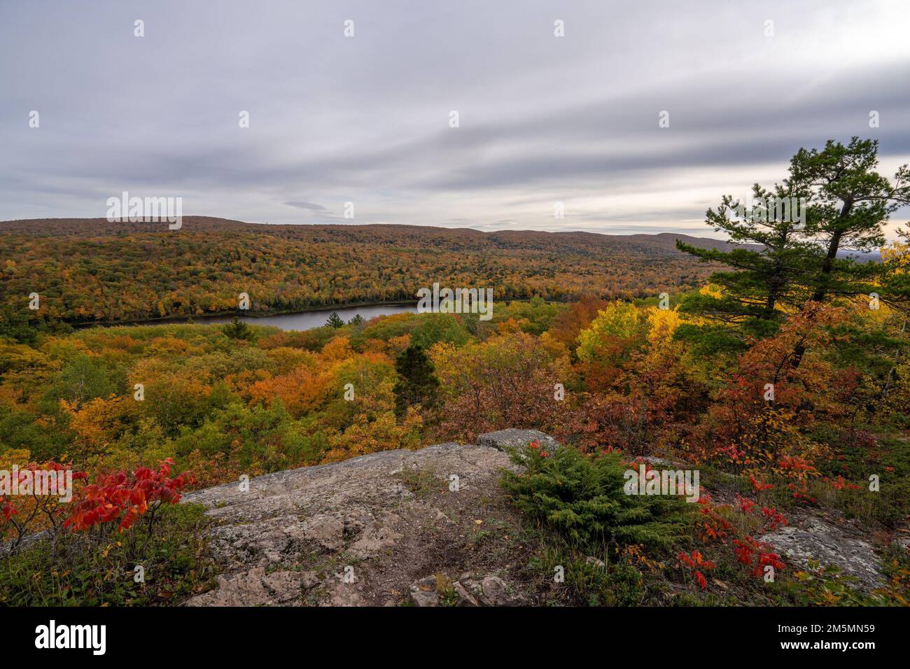An autumnal view of the Porcupine Mountains State Park on a cloudy day ...