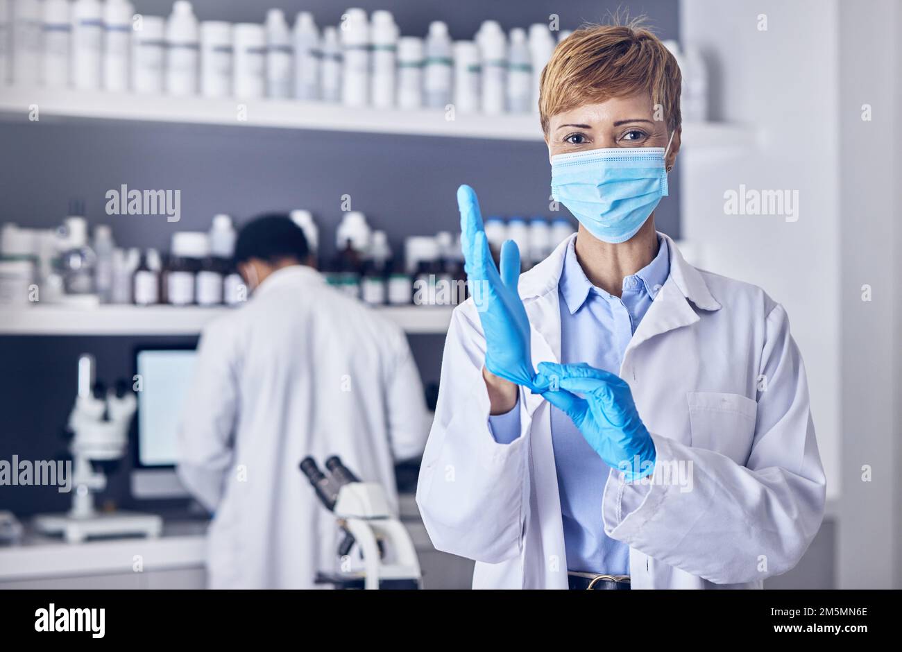 Scientist medical glove hi-res stock photography and images - Alamy