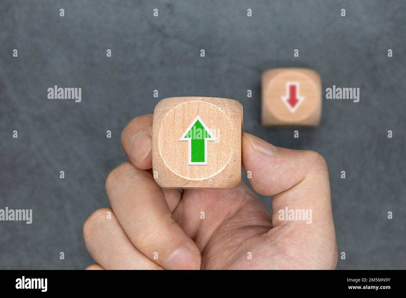 "Up, down" wooden block with arrows Stock Photo - Alamy