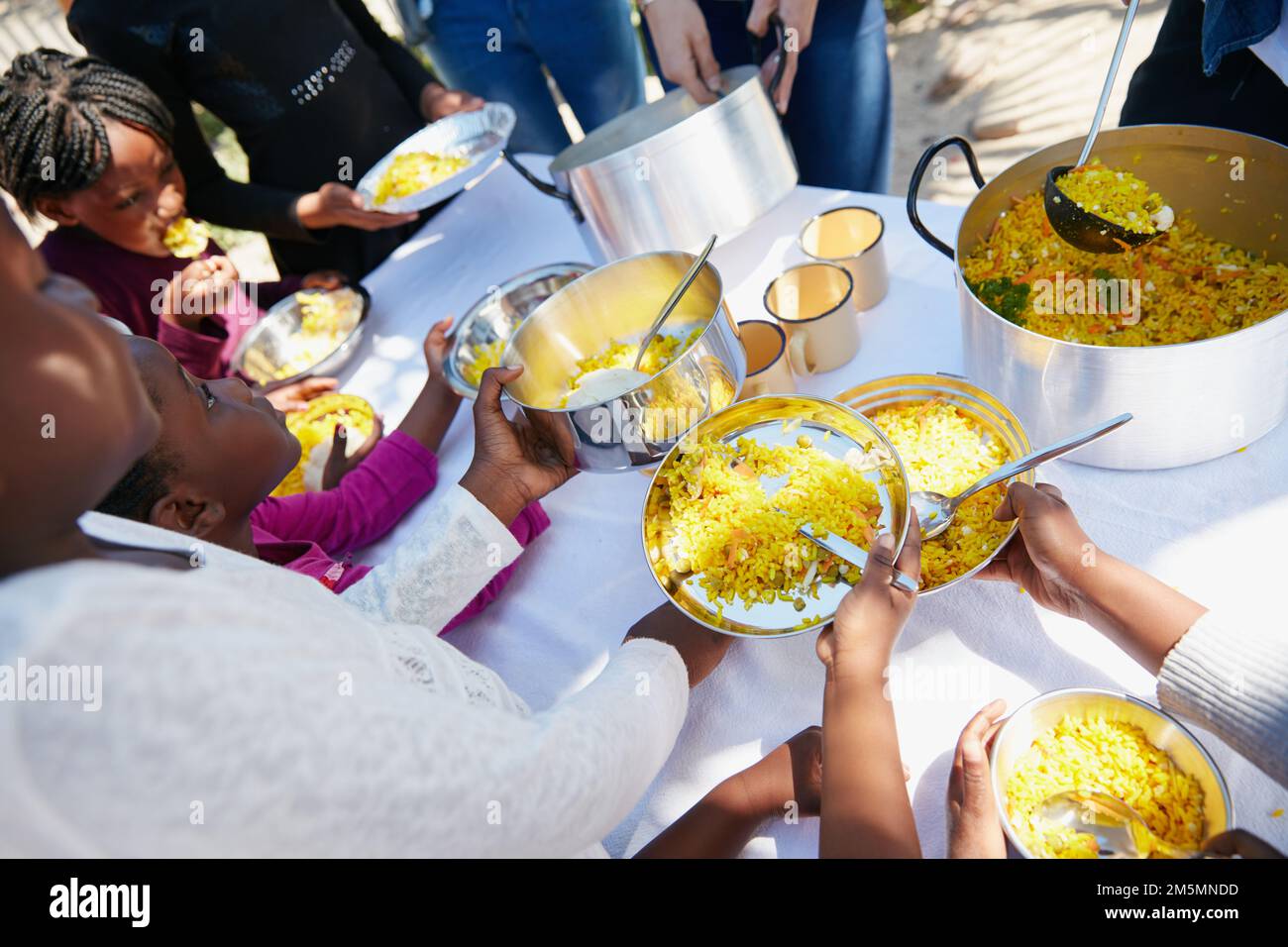 No one will be hungry after this. children getting fed at a food ...