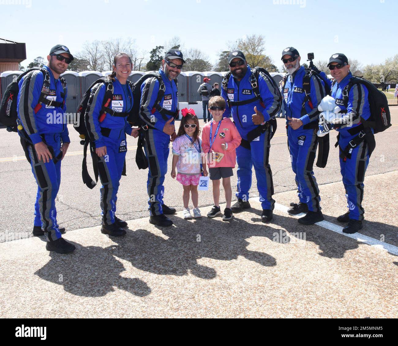 All Veteran Parachute team at the Columbus AFB Airshow, poses with two ...