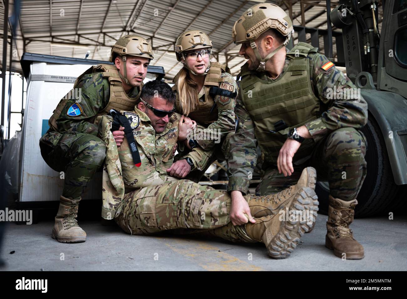 U.S. Air Force, Army, and NATO partners practice carrying simulated ...