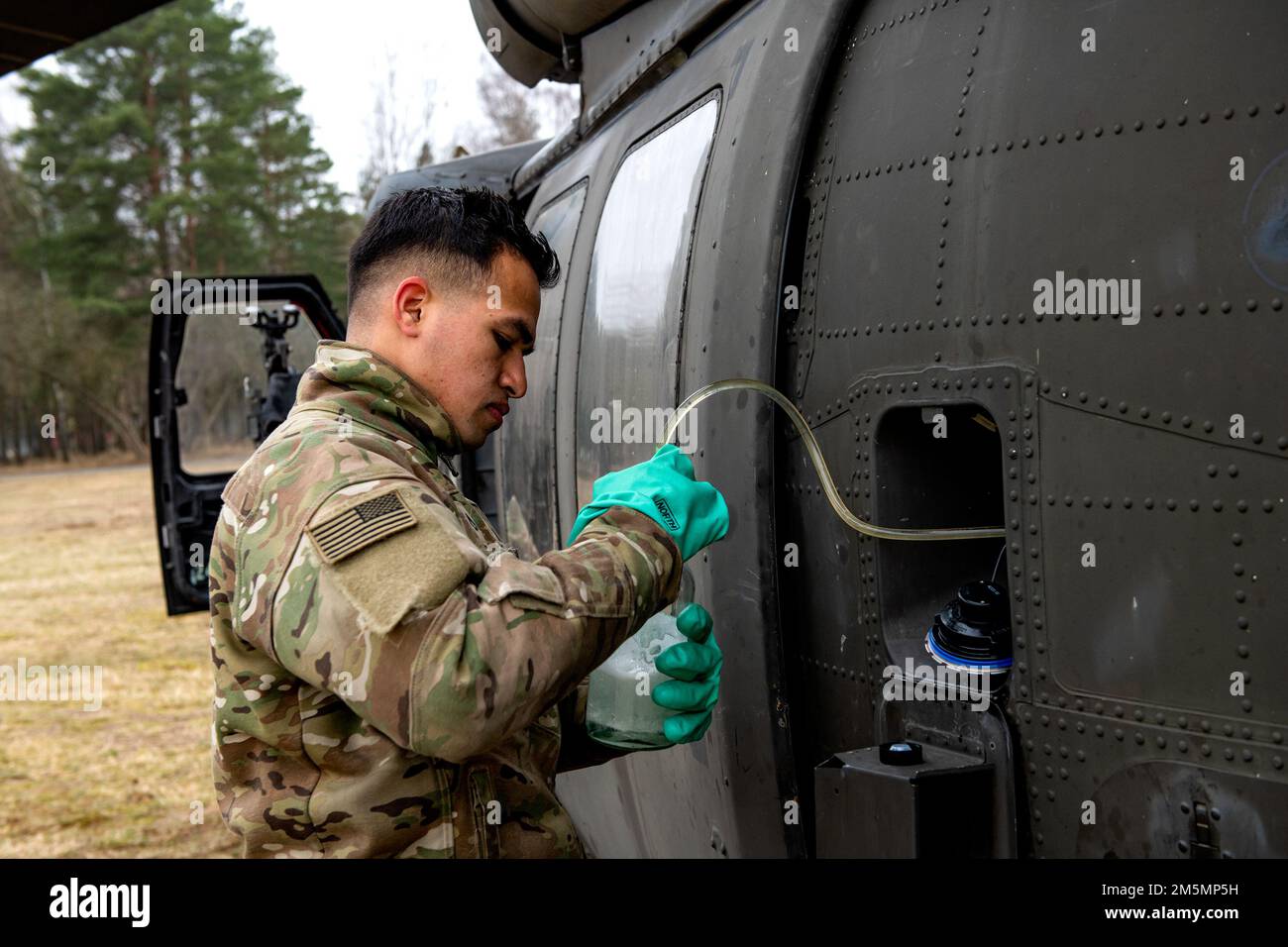 Uh 60 helicopter repairer hi-res stock photography and images - Alamy