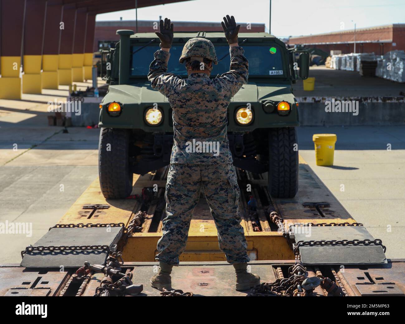 U.S. Marine Corps Lance Cpl. Kittima Oudomhack, a vehicle recovery ...