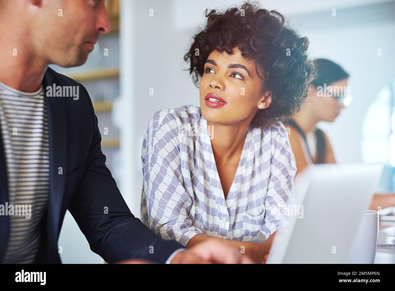 Youve got some great ideas for our company. coworkers using a laptop ...