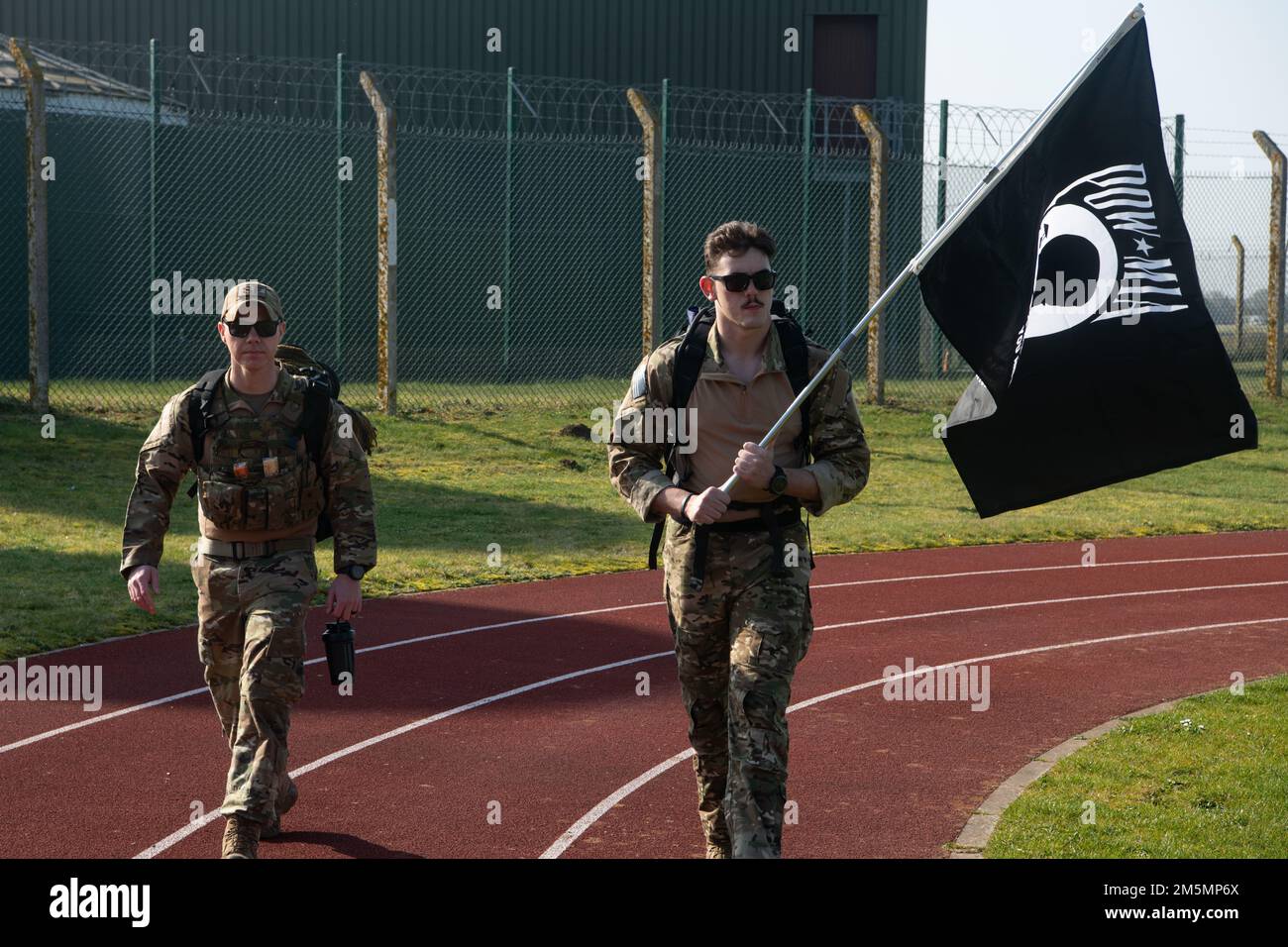 U.S. Air Force Airman 1st Class Austin Parks, right, 100th Security ...