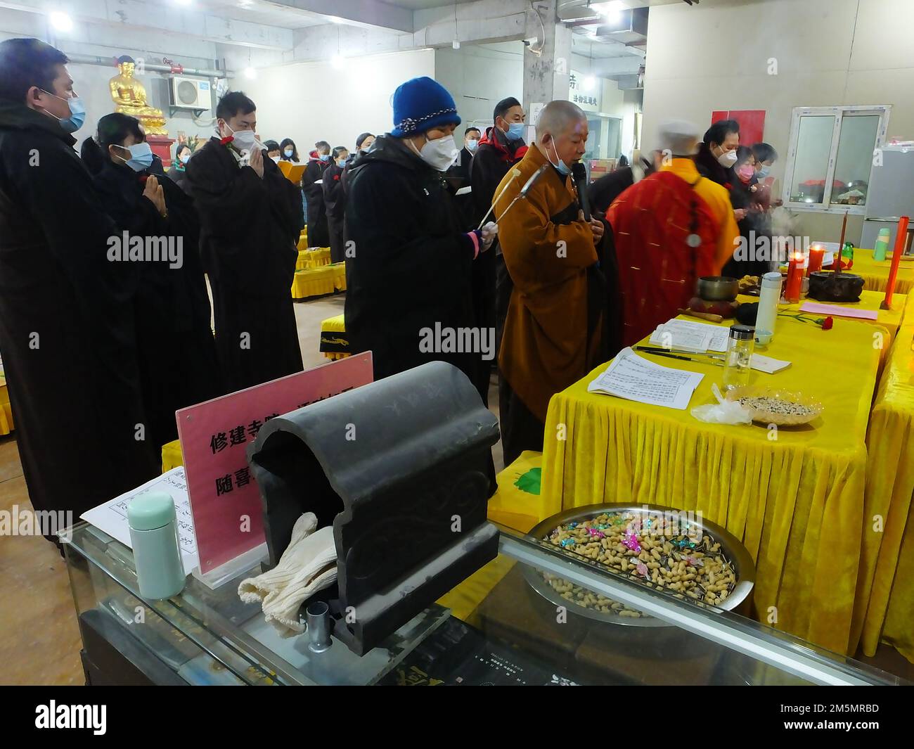 YICHANG, CHINA - DECEMBER 30, 2022 - Visitors pray for blessings at the ...