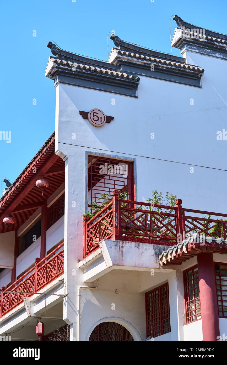 The exterior of a Chinese architecture facade temple with walls and red ...