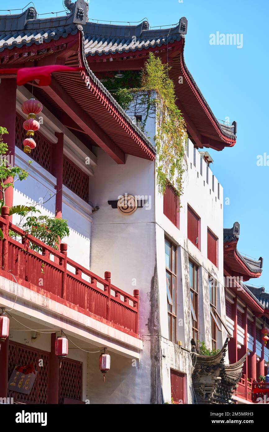 The exterior of a Chinese architecture facade temple with walls and red ...
