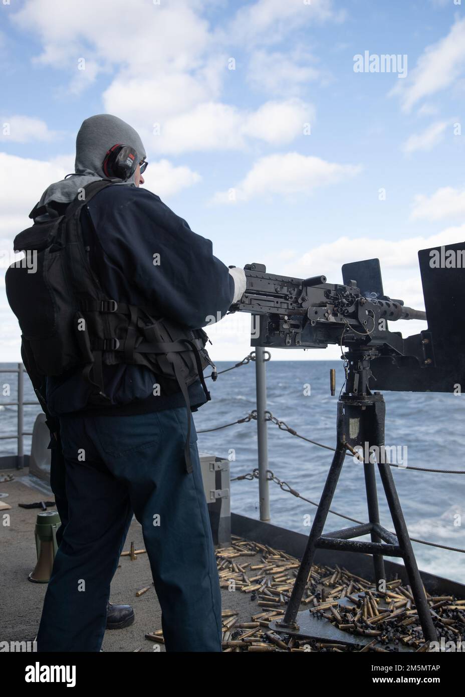 Midshipmen Micah Warren, from Carslice, Pennsylvania, fires a .50 ...
