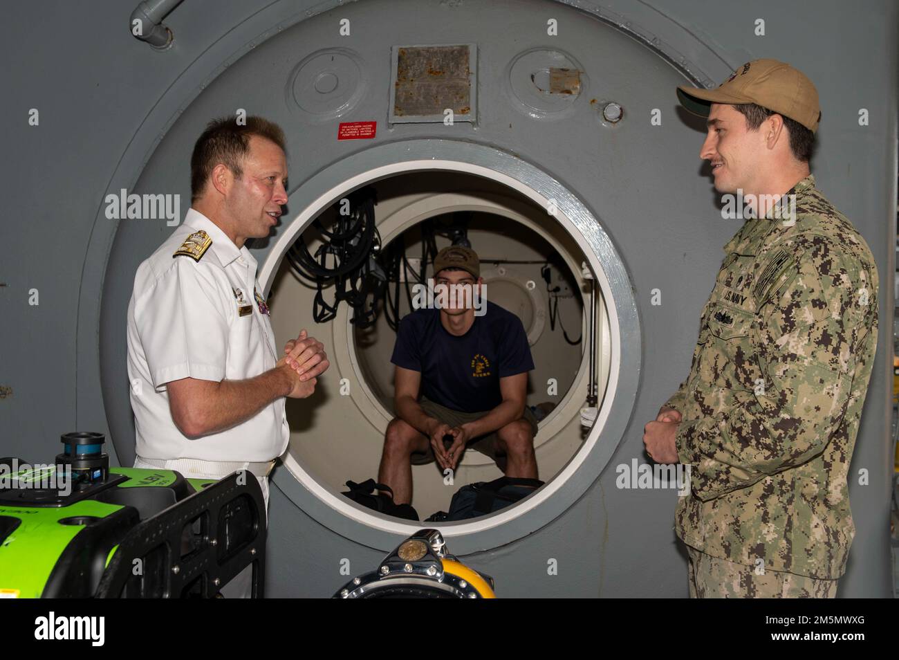 SYDNEY (March 28, 2022) – Navy Diver 1st Class Chace Benefield, right ...