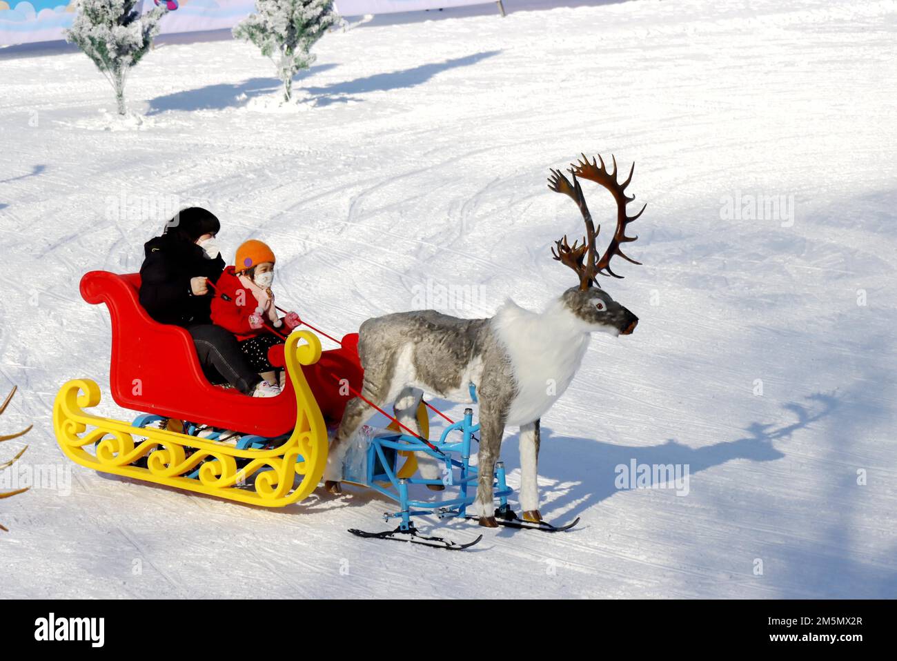 People play at the 13th Taoranting Ice Carnival kicked off in Beijing ...
